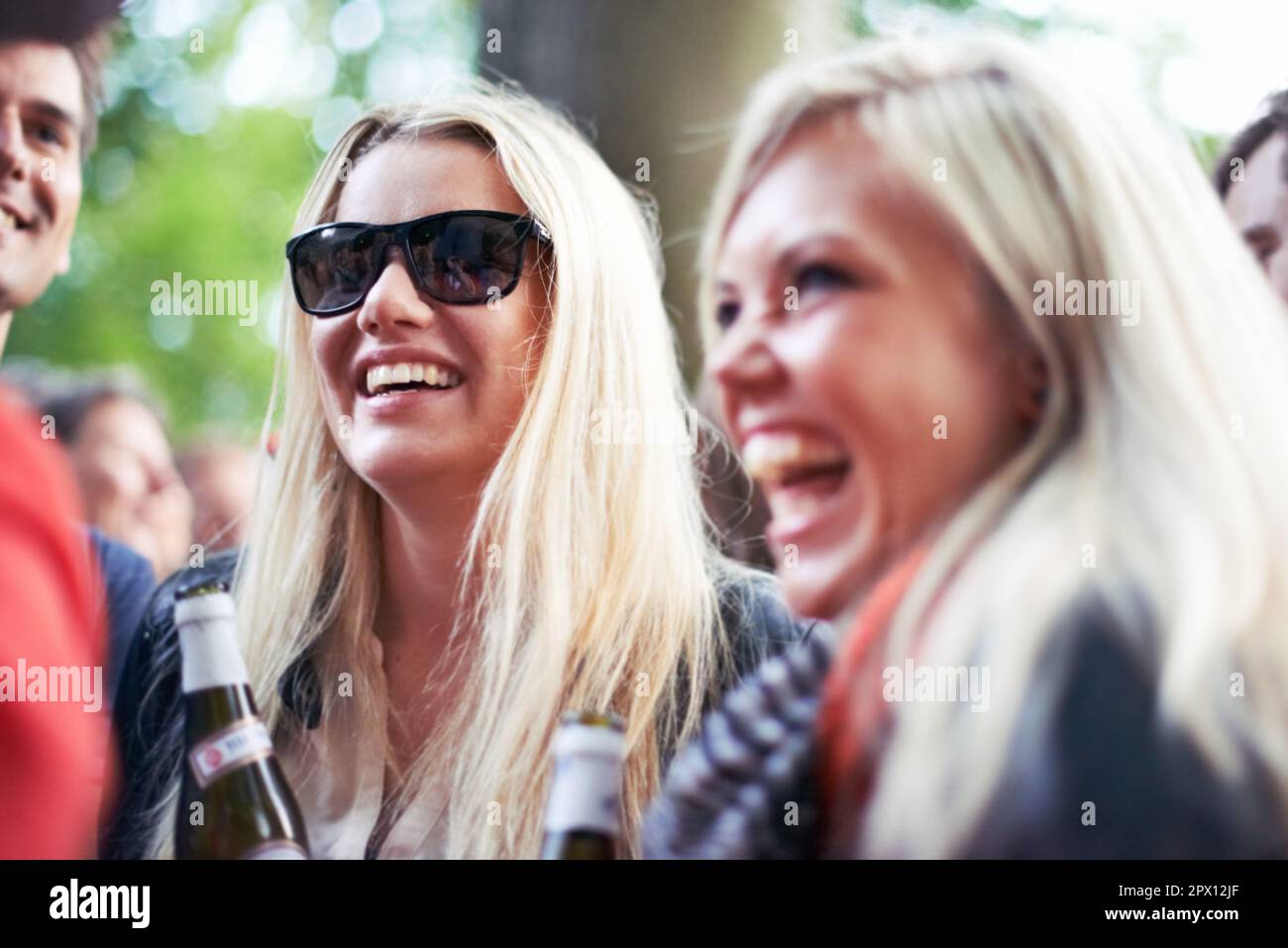 Girls just wanna have fun. two friends enjoying an outdoor festival ...