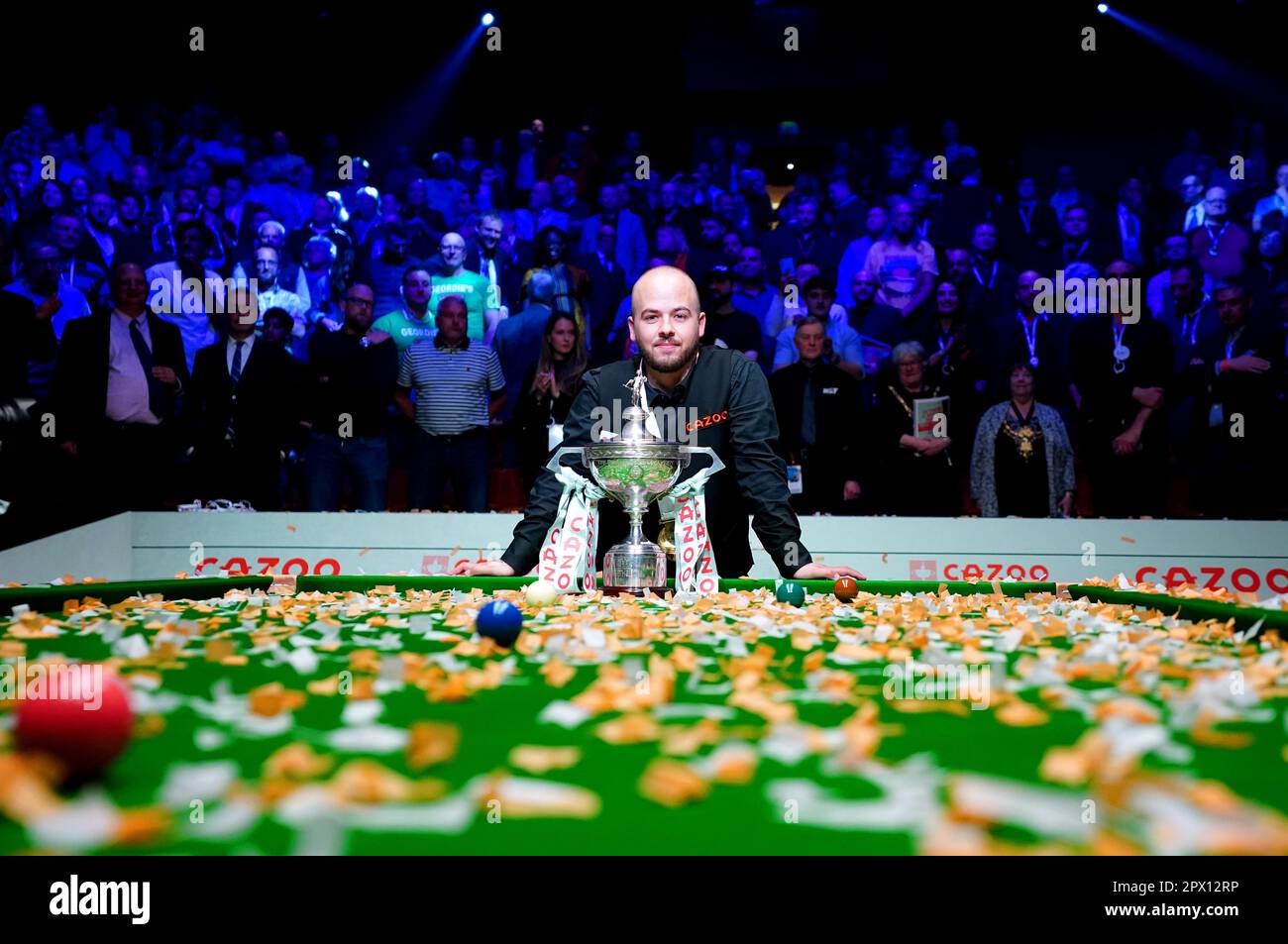 Luca Brecel celebrates with the trophy after beating Mark Selby to win ...