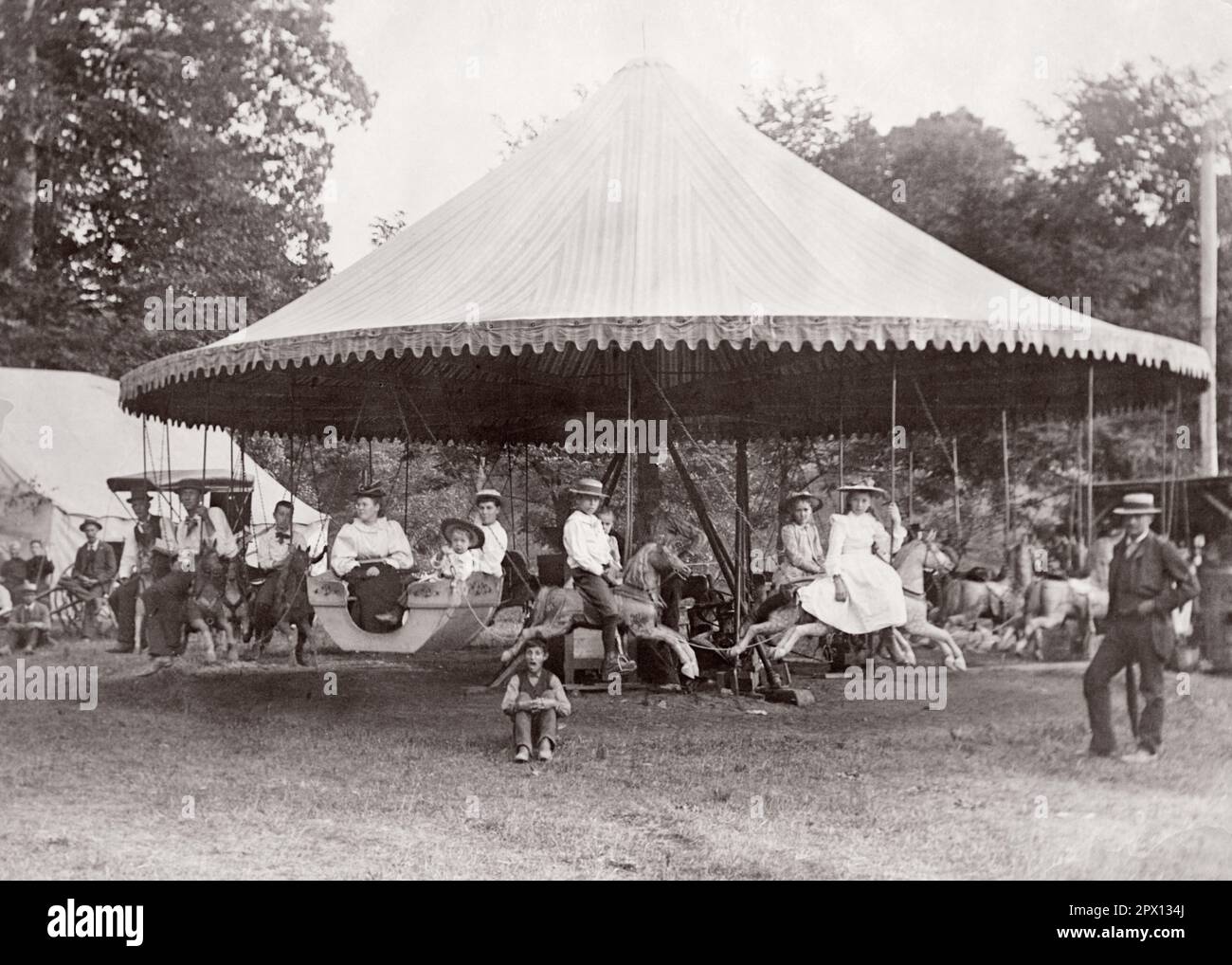 1890s MEN WOMEN AND CHILDREN POSED ON MERRY-GO-ROUND IN SHELTON GROVE ...