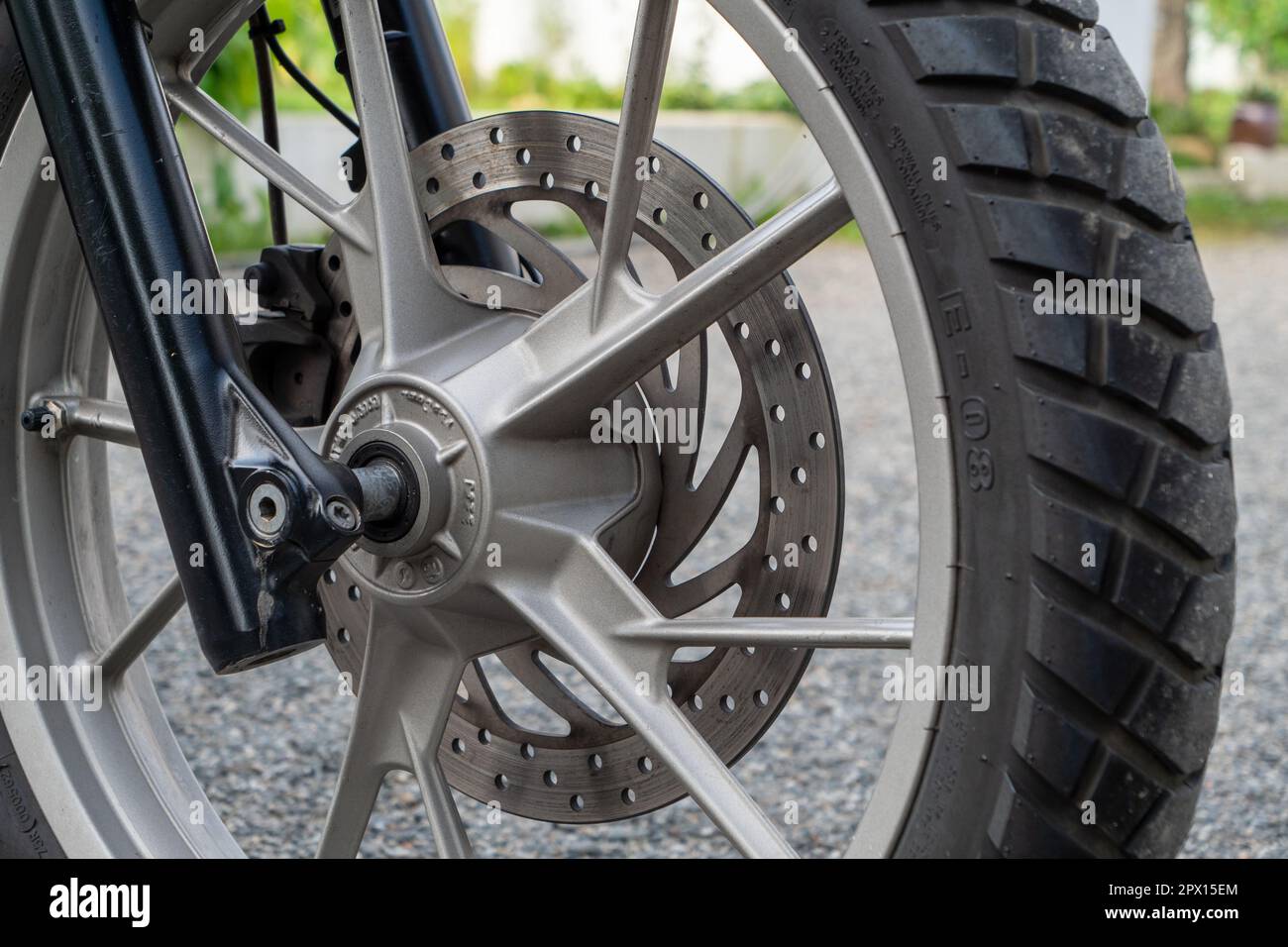 a close-up of motorcycle brakes and front wheel Stock Photo - Alamy