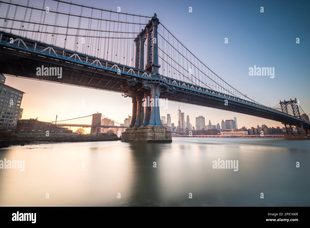Manhattan Bridge seen from the coast next to the D.U.M.B.O area, during ...