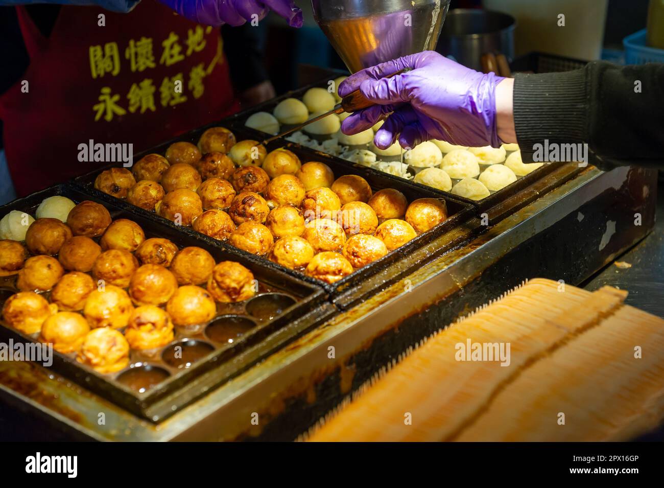 Preparing Takoyaki Balls at Ningxia Night Market, Taipei, Taiwan Stock ...