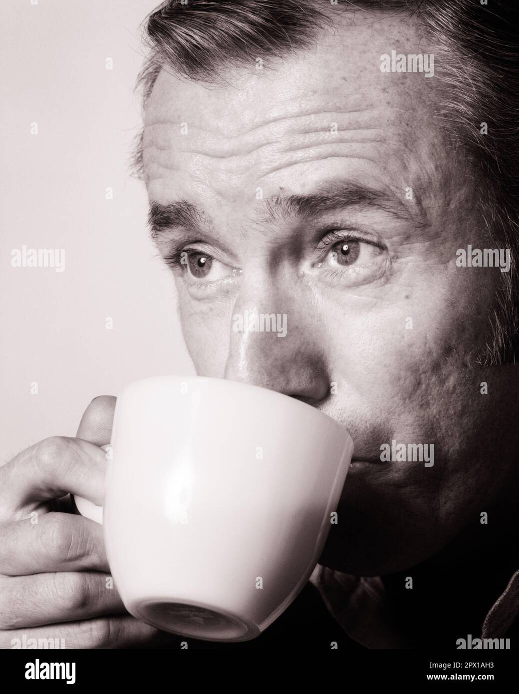 1970s CLOSE-UP MATURE MAN DRINKING CUP OF COFFEE - f13485 HAR001 HARS ...