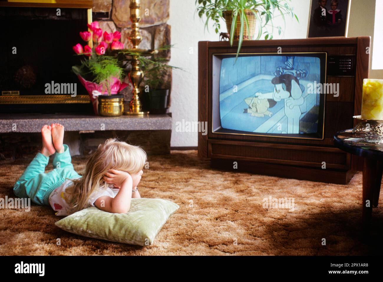 Watching cartoon 1980s hi-res stock photography and images - Alamy