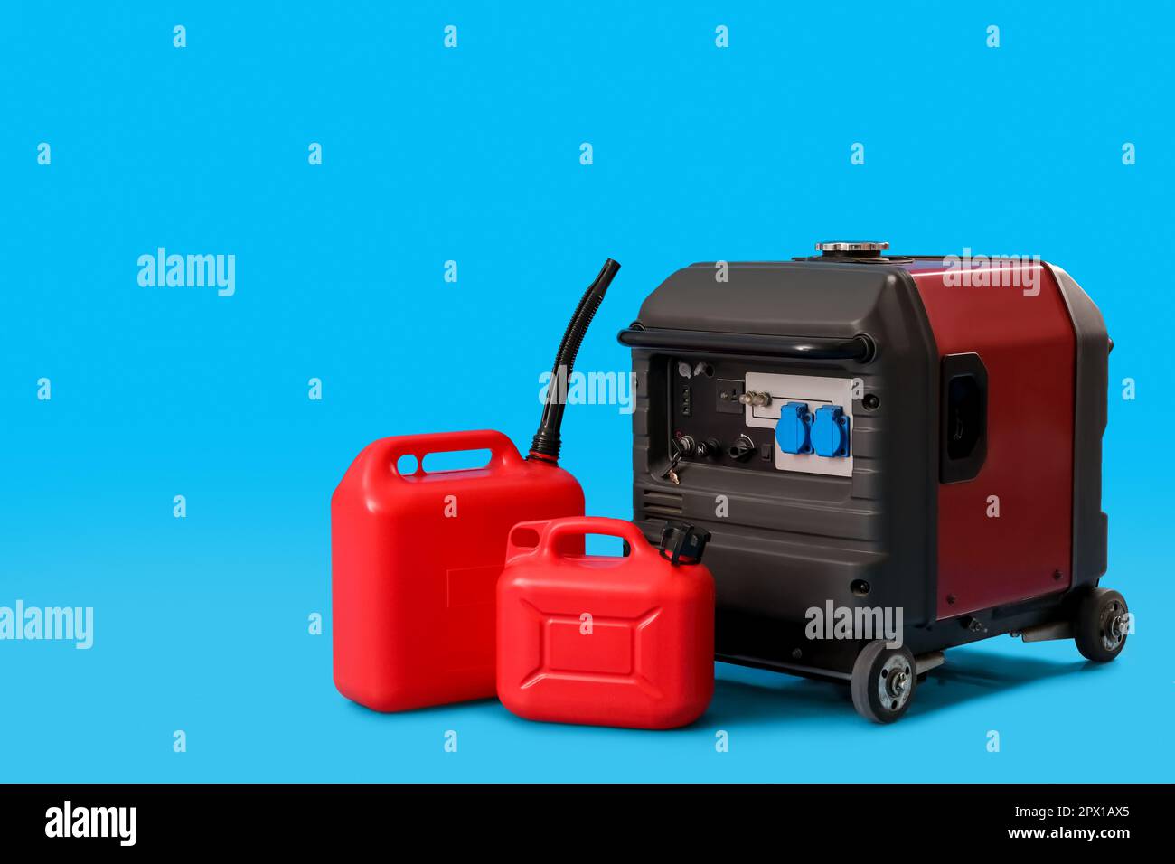 Portable gasoline generator with canisters on blue background Stock ...