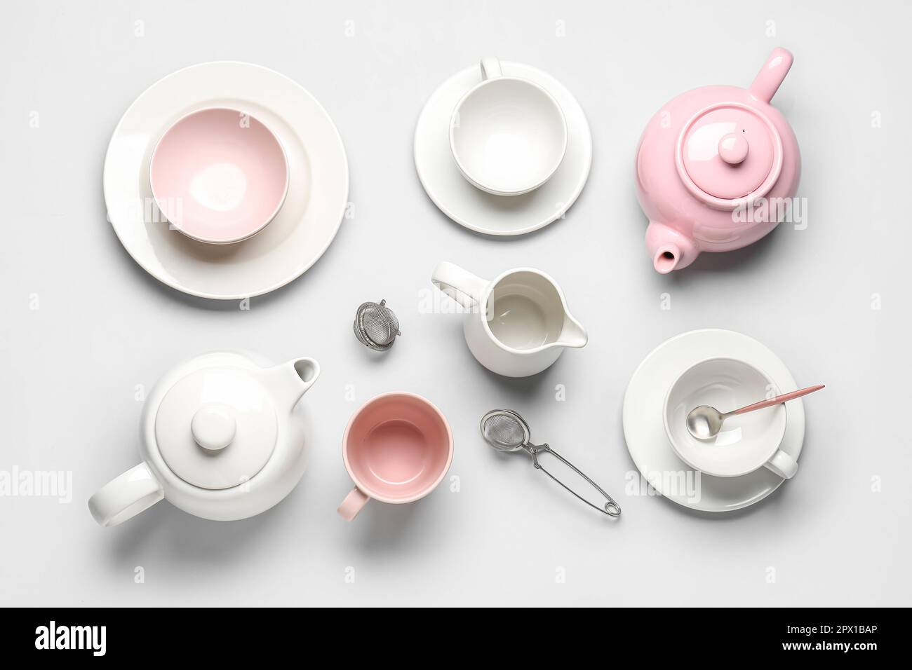 Composition with stylish tea set on grey background Stock Photo - Alamy