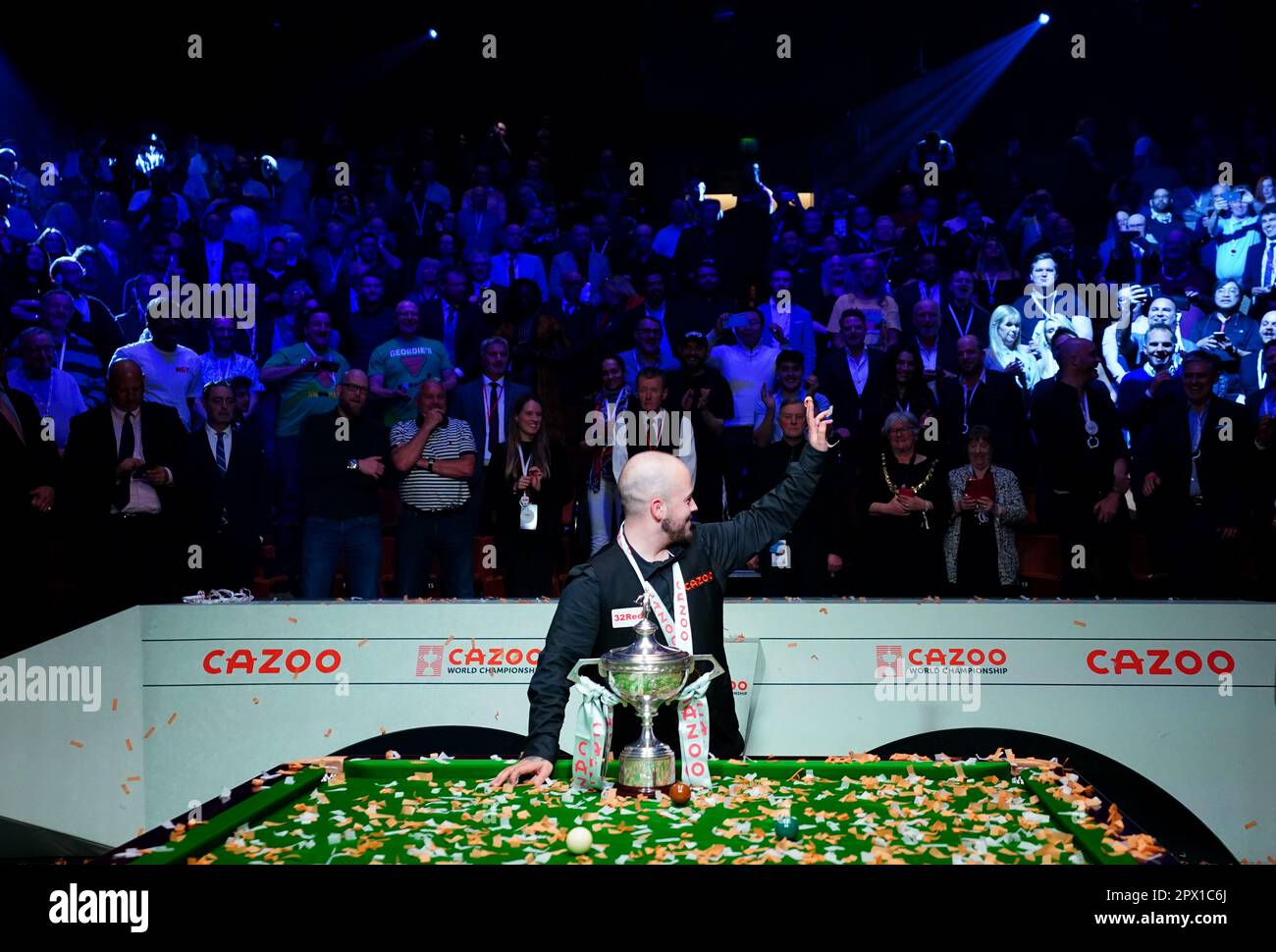 Luca Brecel waves to the crowd as he celebrates beating Mark Selby to ...