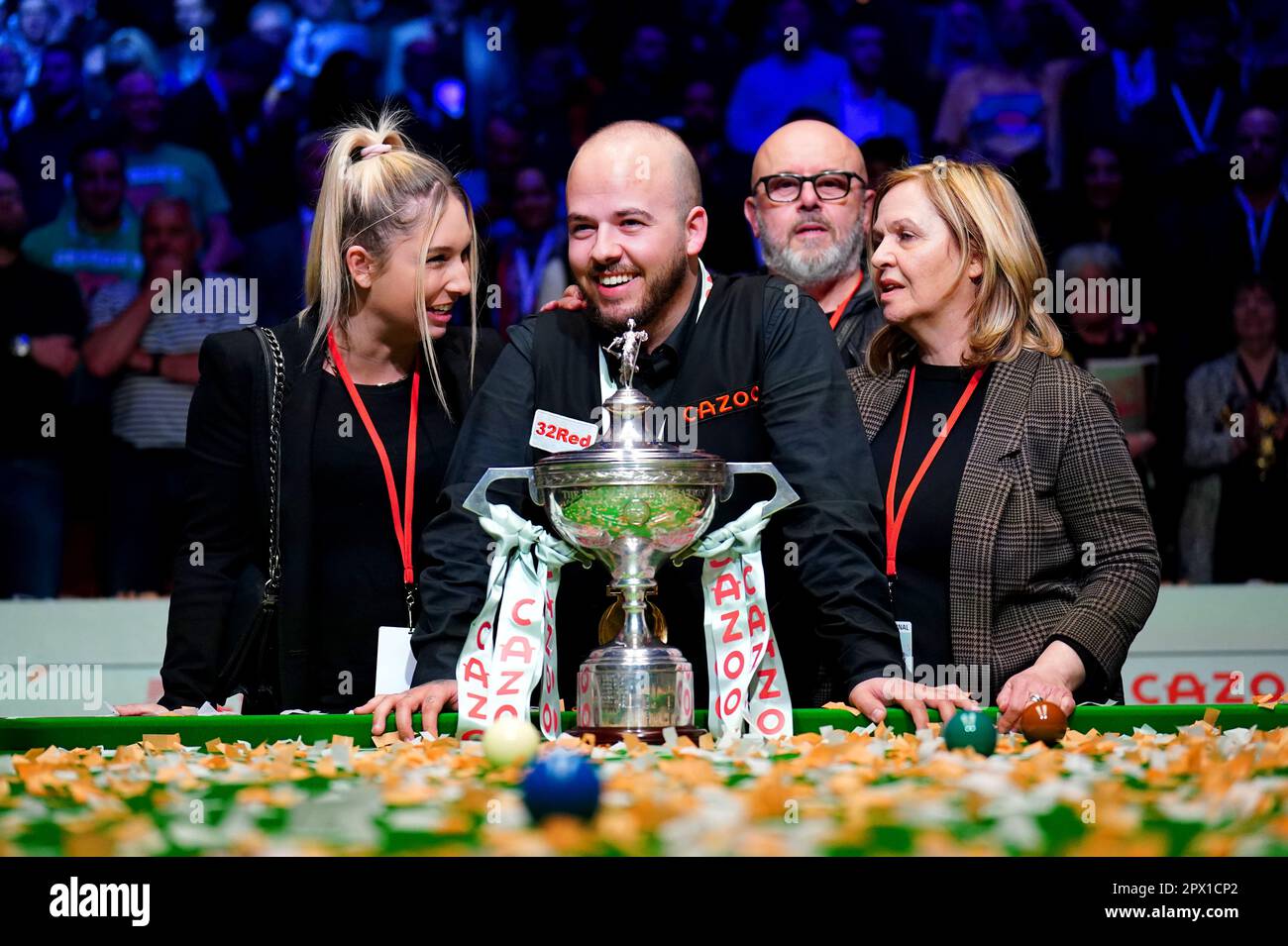 Luca Brecel celebrates with his family after beating Mark Selby to win ...