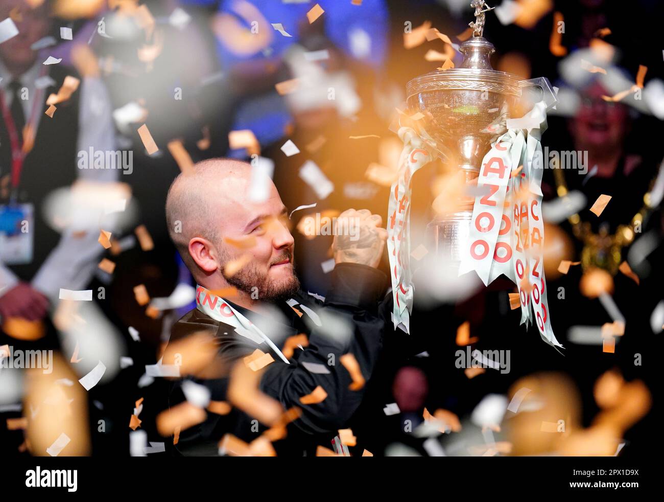 Luca Brecel celebrates with the trophy after beating Mark Selby to win ...