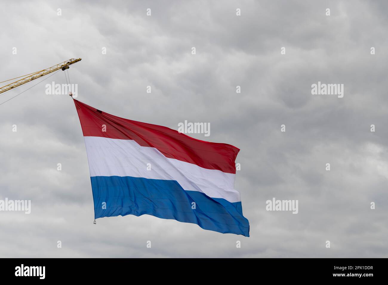 Dutch flag hoisted on a national holiday Stock Photo - Alamy