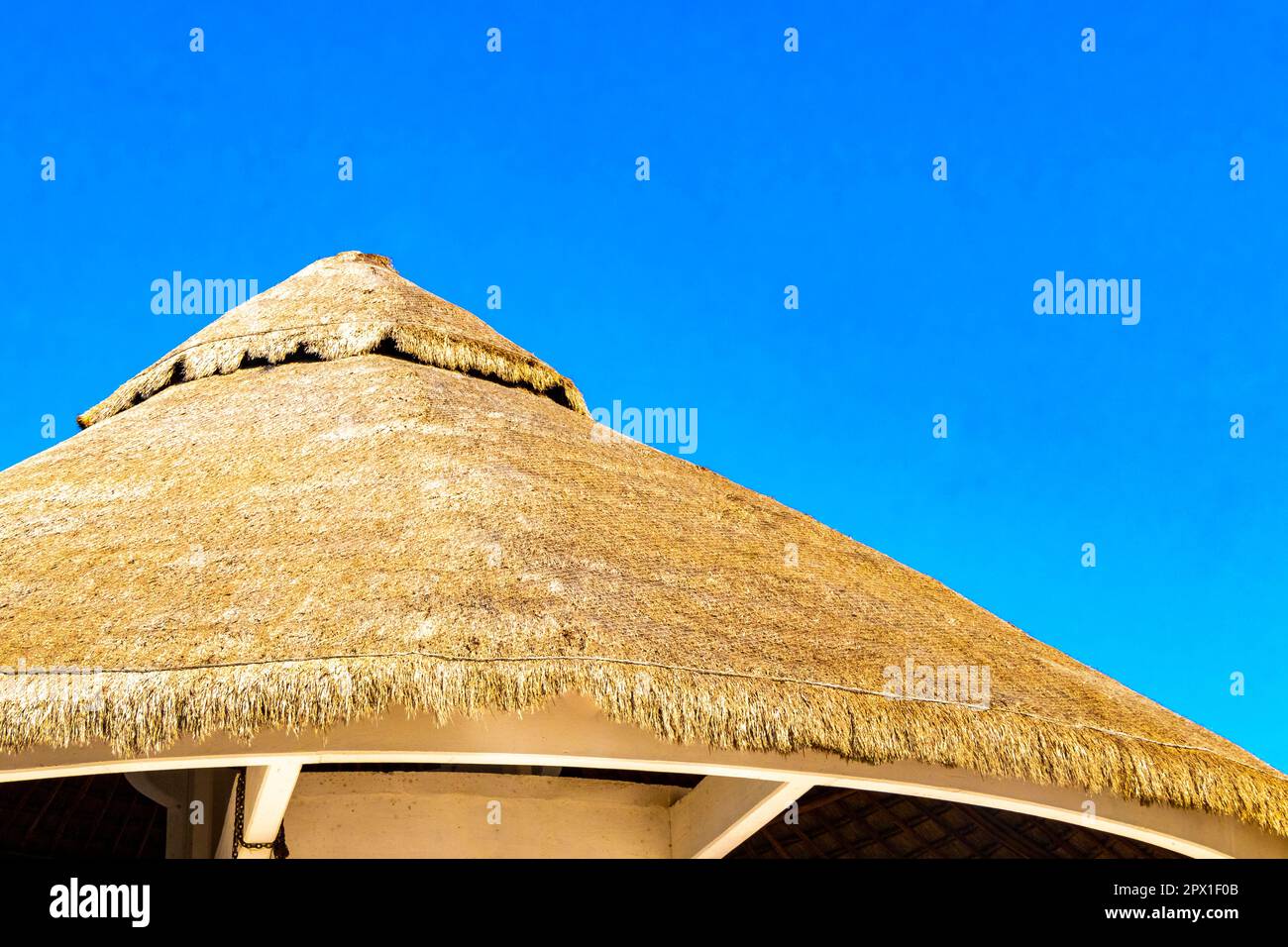 Palapa roof with clear blue sky in paradise in Chiquila Lazaro Cardenas ...