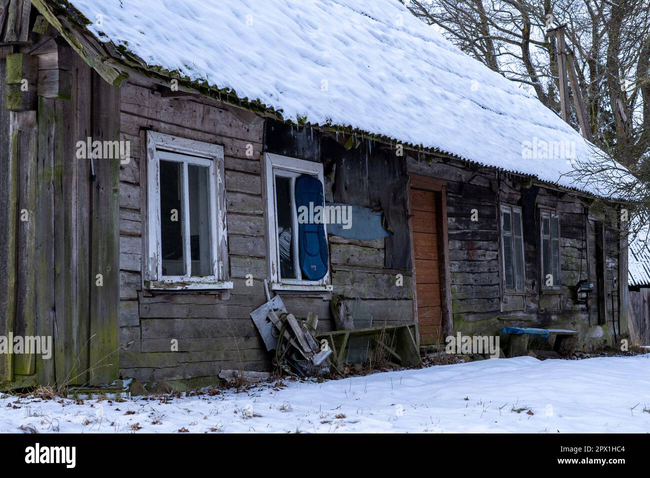 Old wooden abandoned and ruinous country house in rural Stock Photo - Alamy