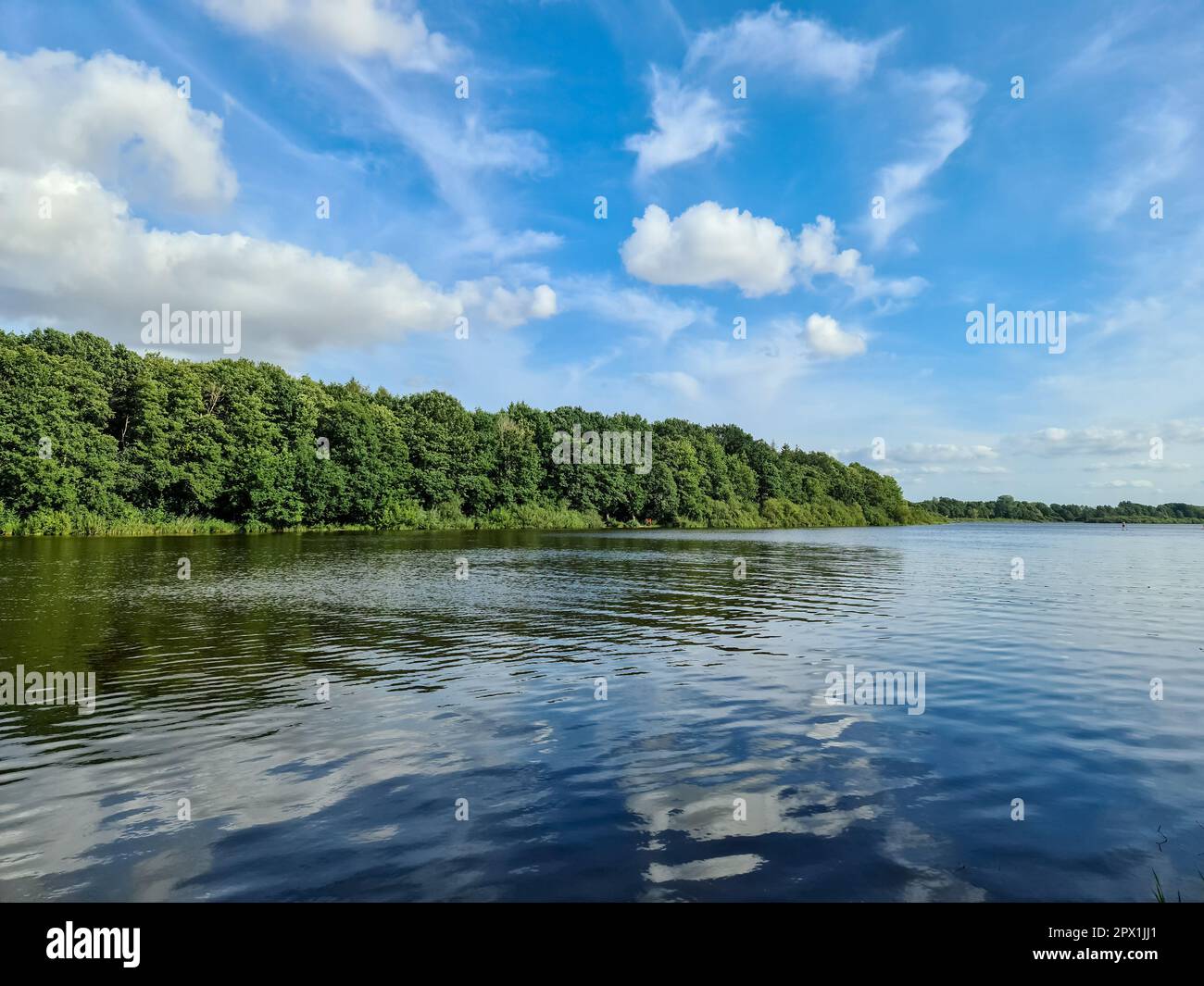 Beautiful landscape at a lake with a reflective water surface Stock ...