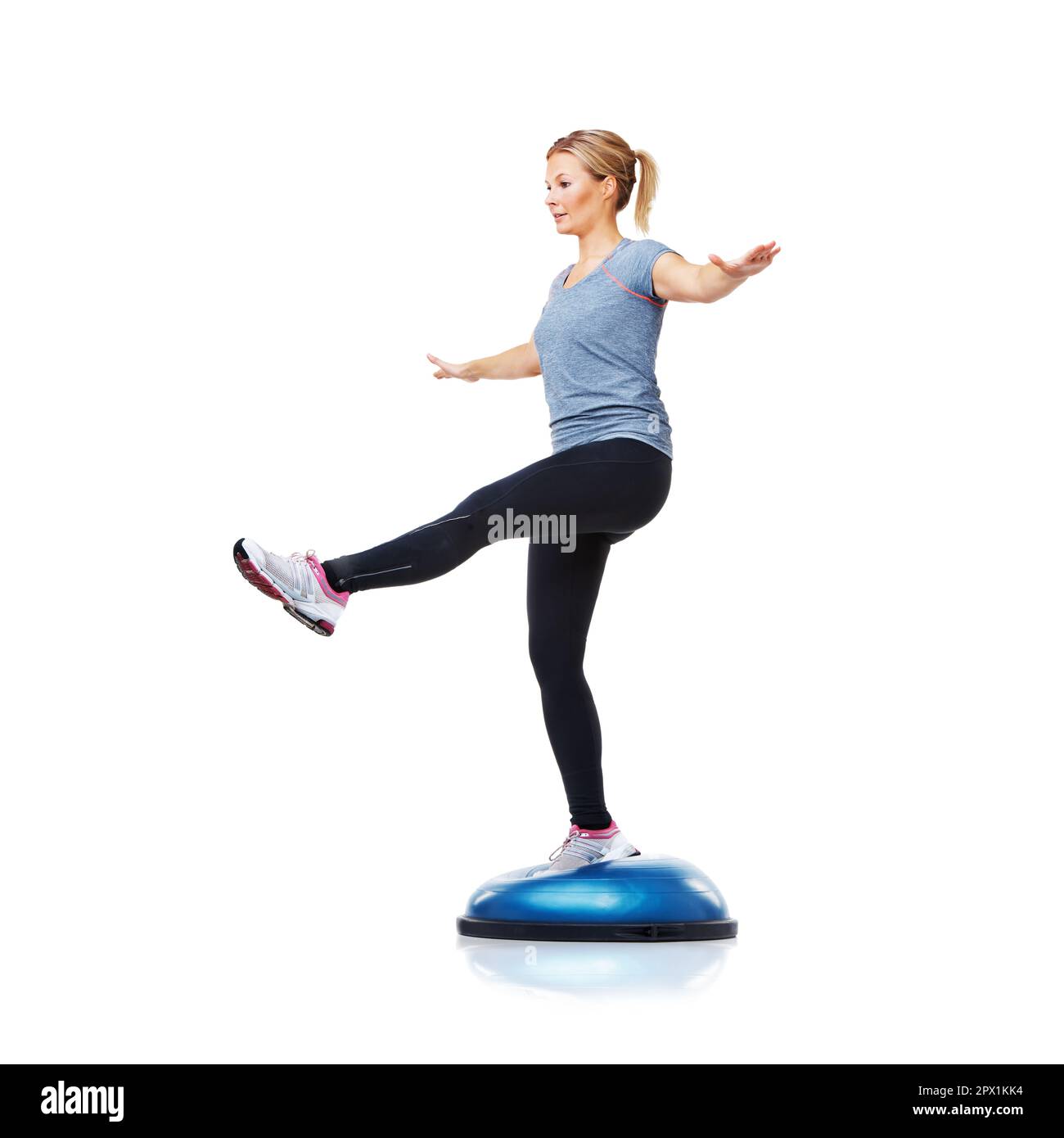 Getting a full-body workout. An attractive young woman working her core ...