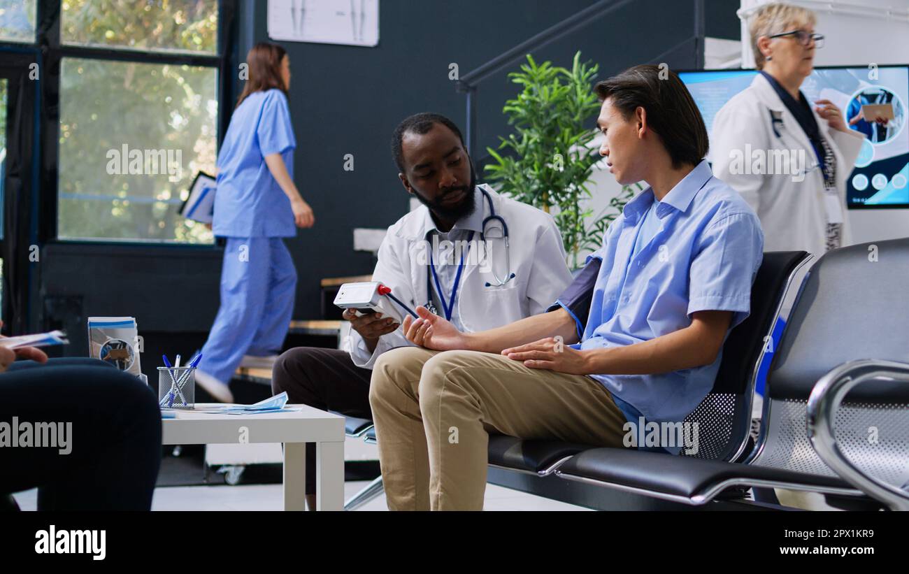 Traumatologist measuring hypertension hypotension hi-res stock ...