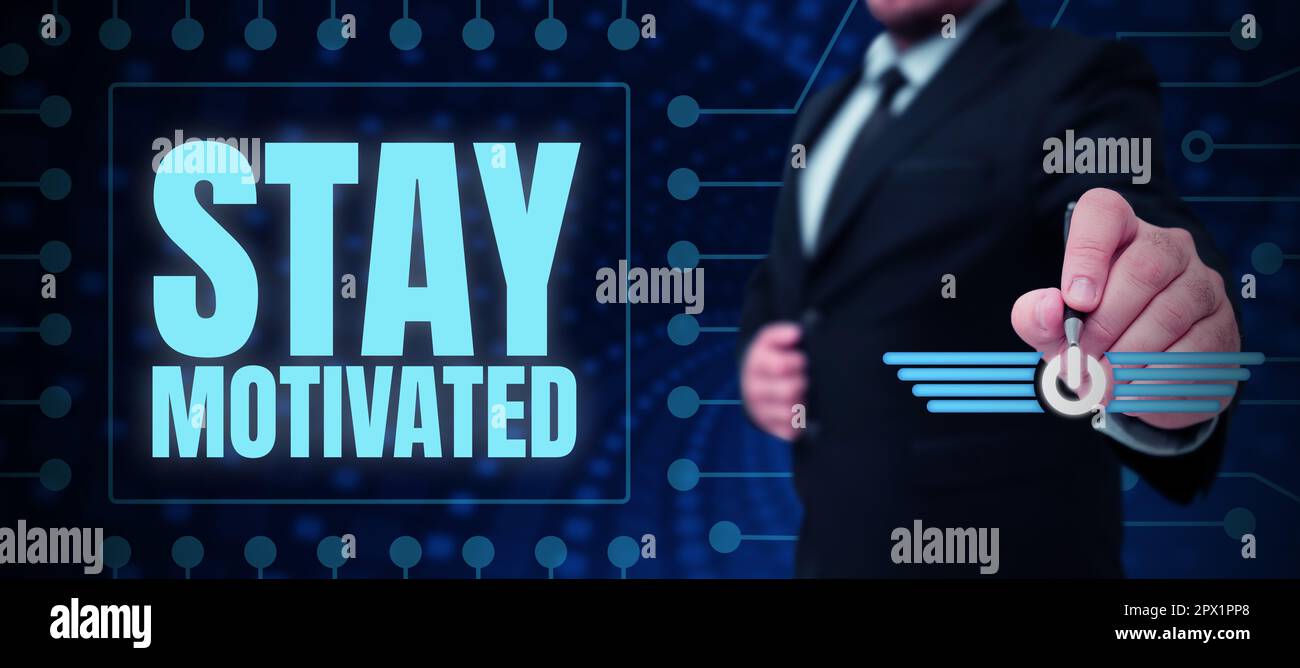 Hand writing sign Stay Motivated, Word for Reward yourself every time ...