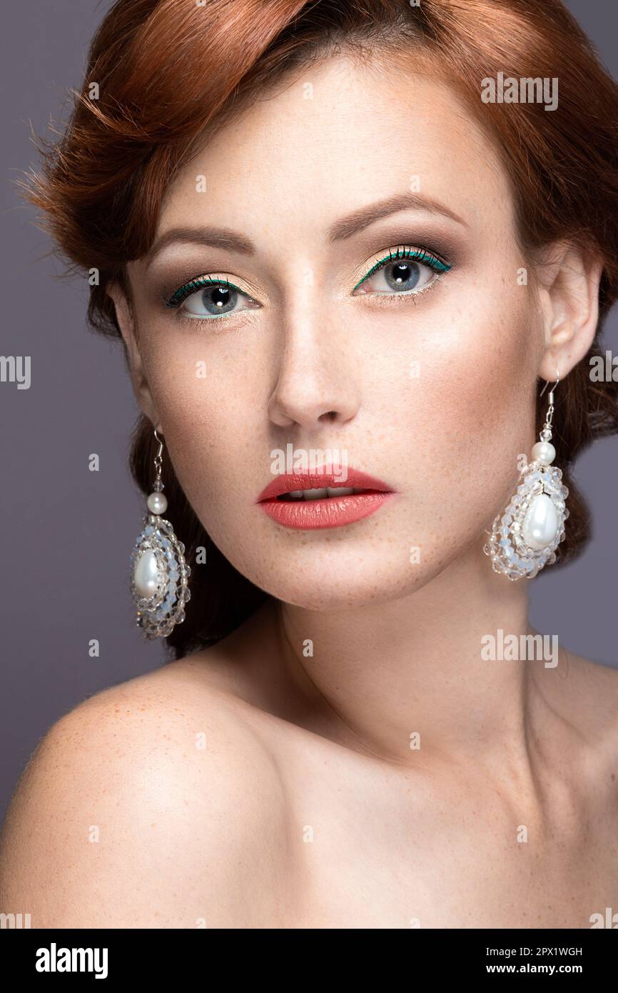 Portrait of a beautiful ginger woman in the image of the bride. Picture ...