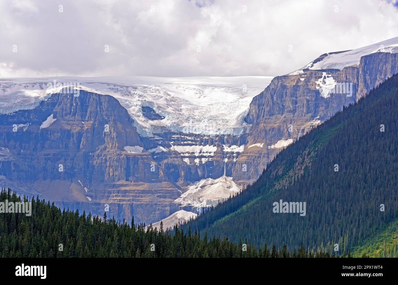 Massive Icefield Falling Over a Mountain Ridge at the Columbia Icefield ...