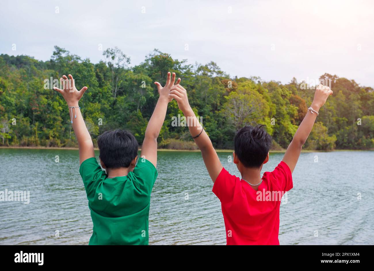 Portrait two brothers standing back hi-res stock photography and images ...