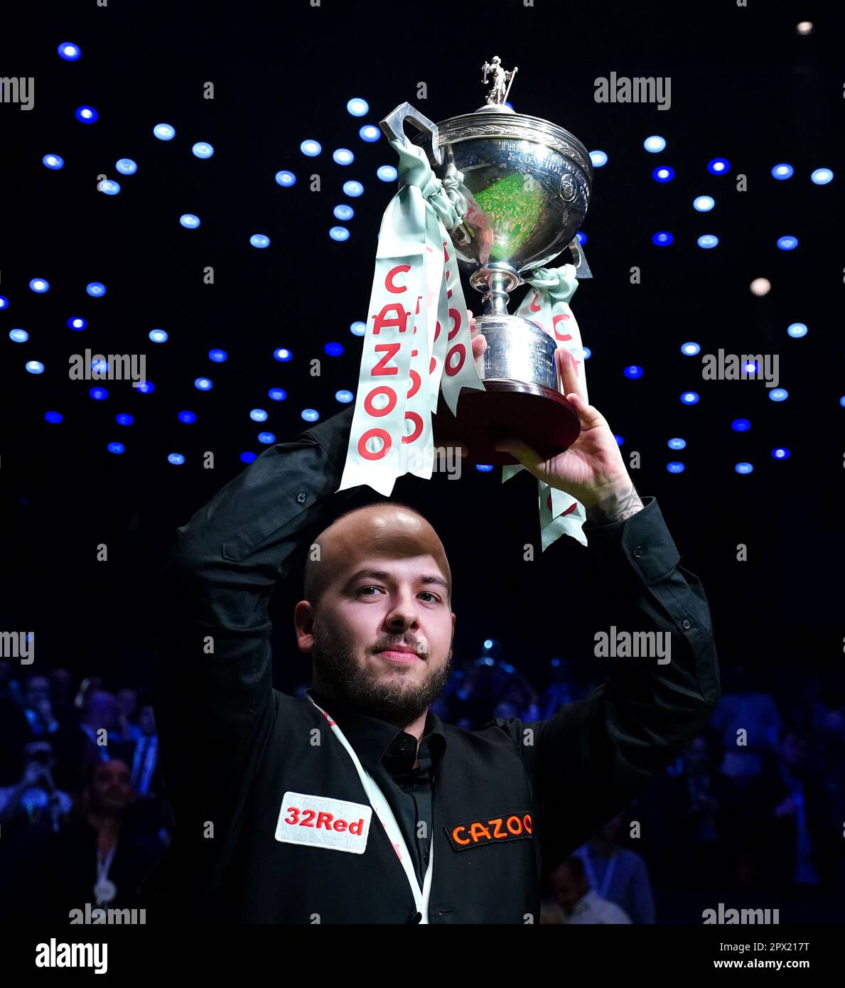 Luca Brecel celebrates after winning the final against Mark Selby (not ...