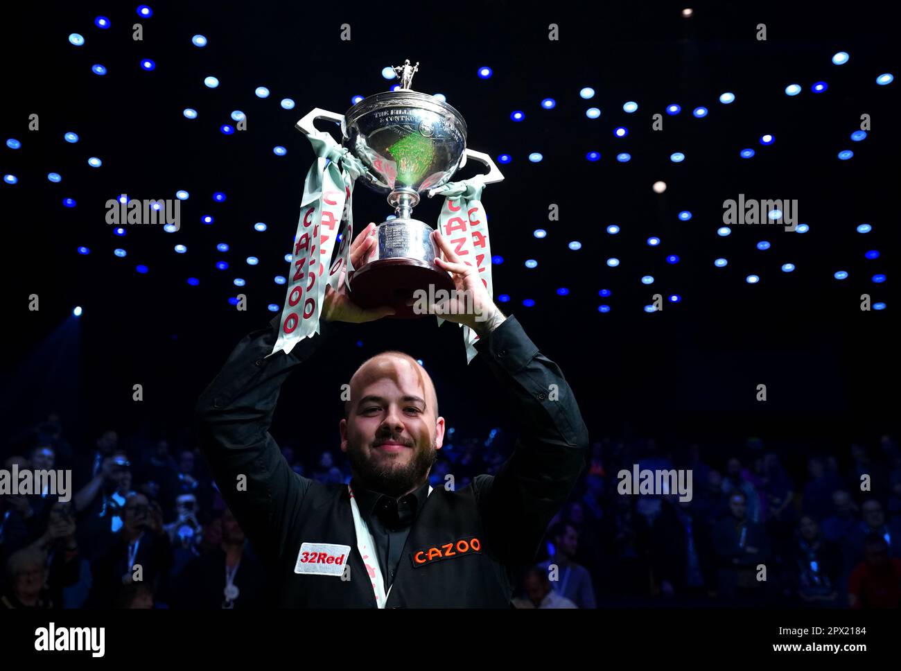 Luca Brecel celebrates after winning the final against Mark Selby (not ...