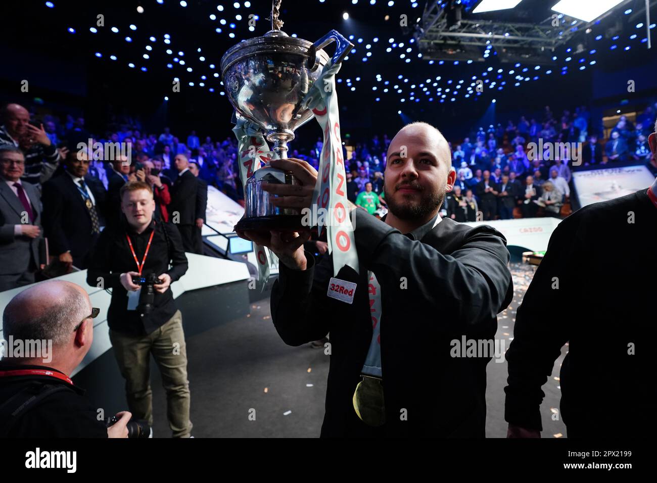 Luca Brecel celebrates after winning the final against Mark Selby (not ...