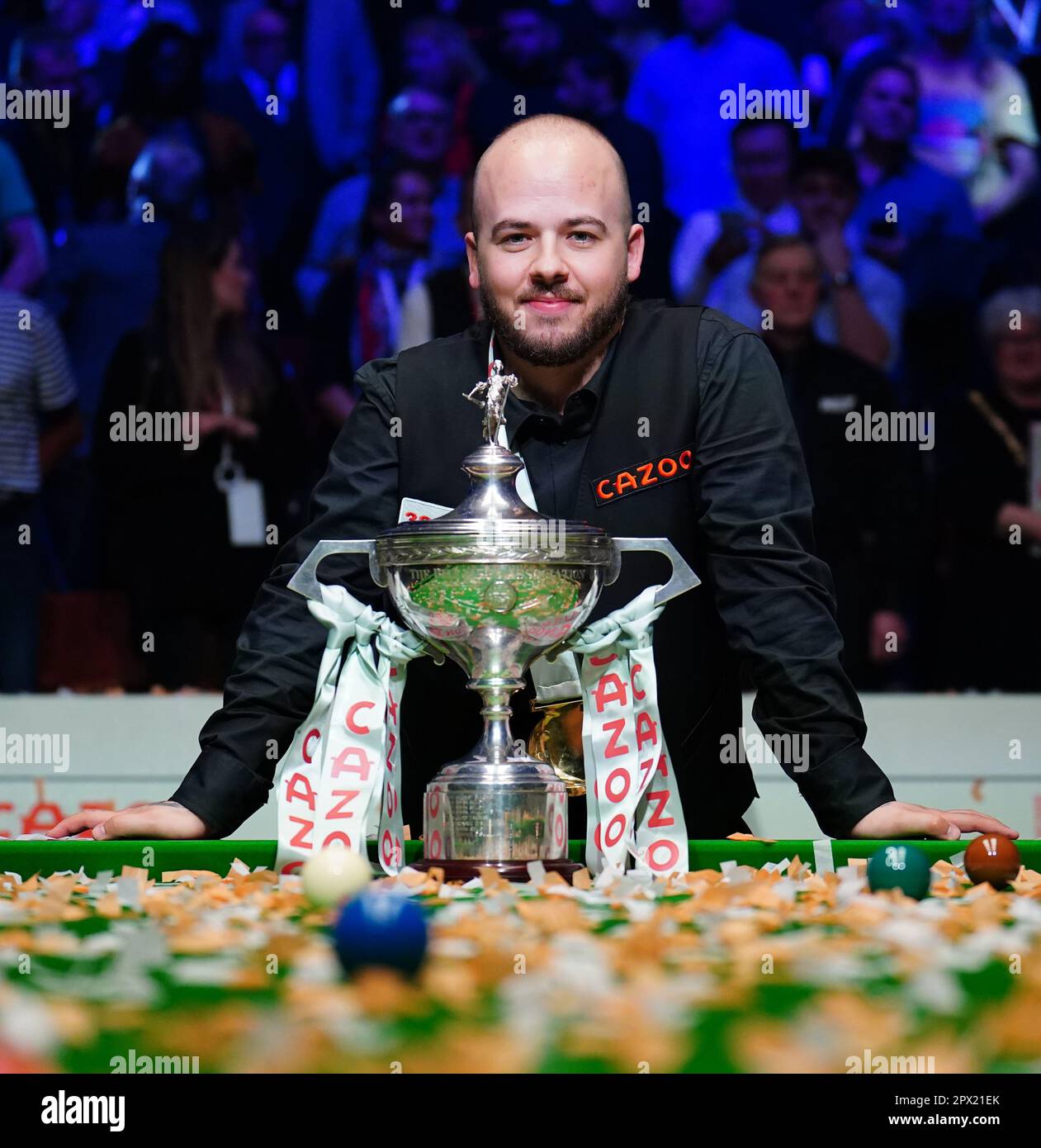 Luca Brecel celebrates after winning the final against Mark Selby (not ...