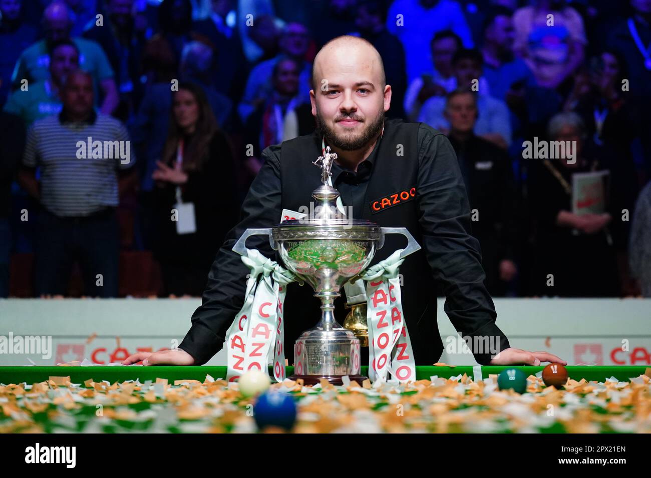 Luca Brecel celebrates after winning the final against Mark Selby (not ...