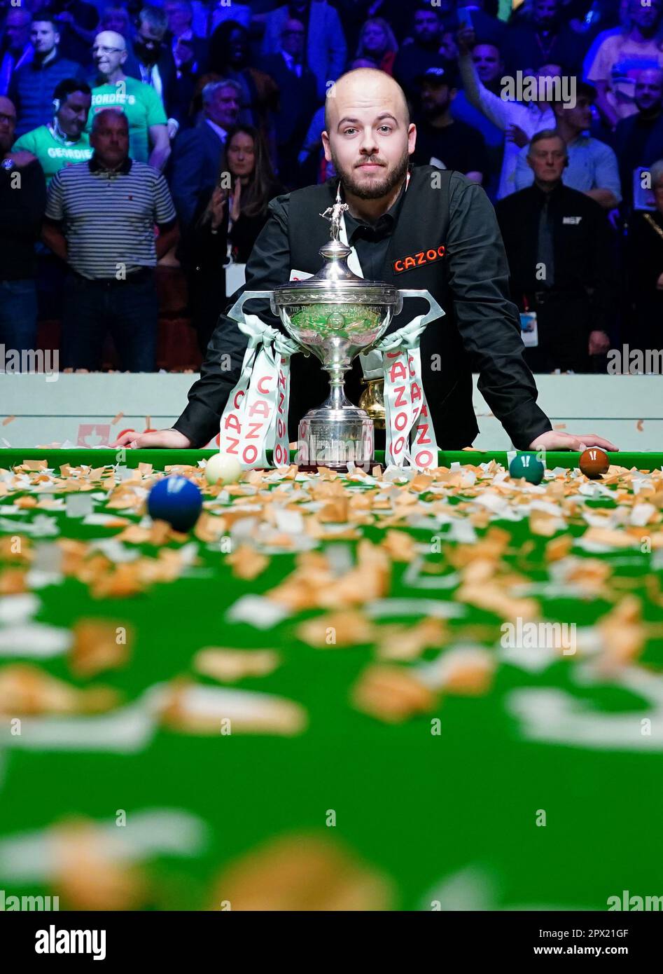 Luca Brecel celebrates after winning the final against Mark Selby (not ...