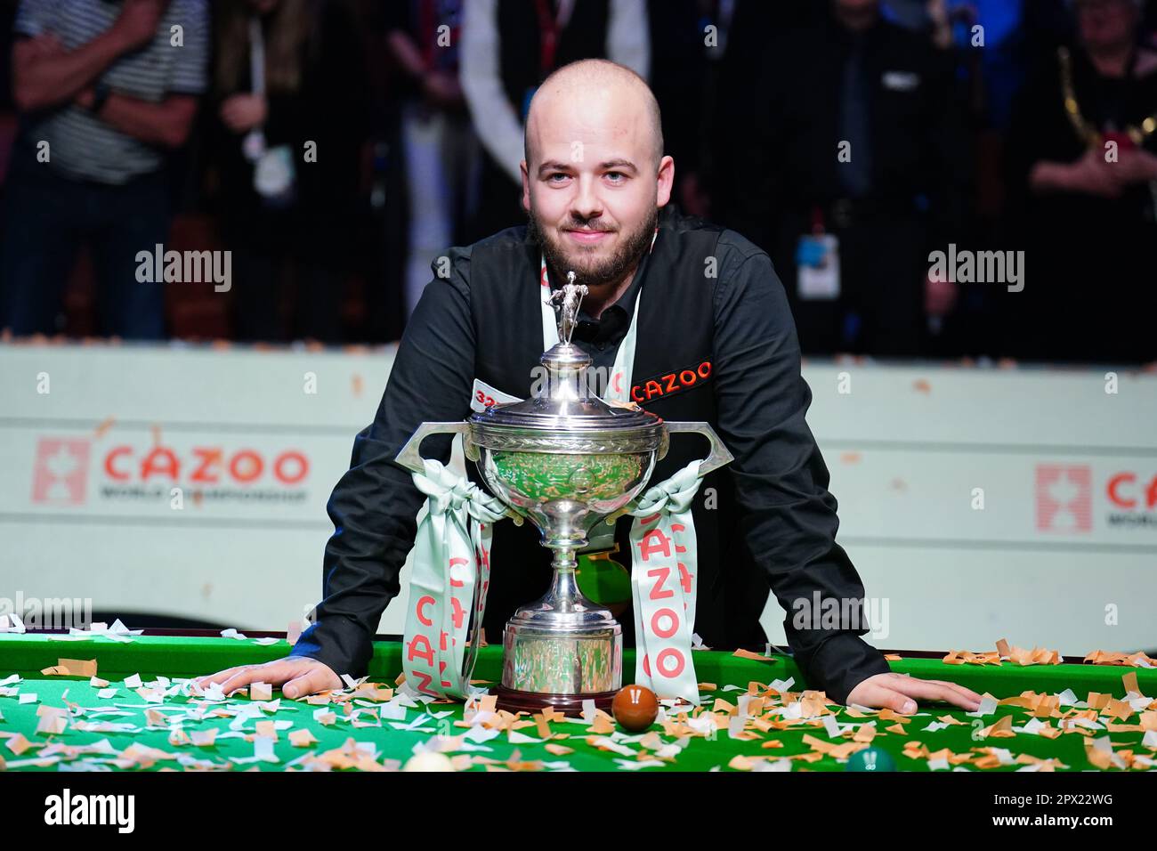 Luca Brecel celebrates after winning the final against Mark Selby (not ...