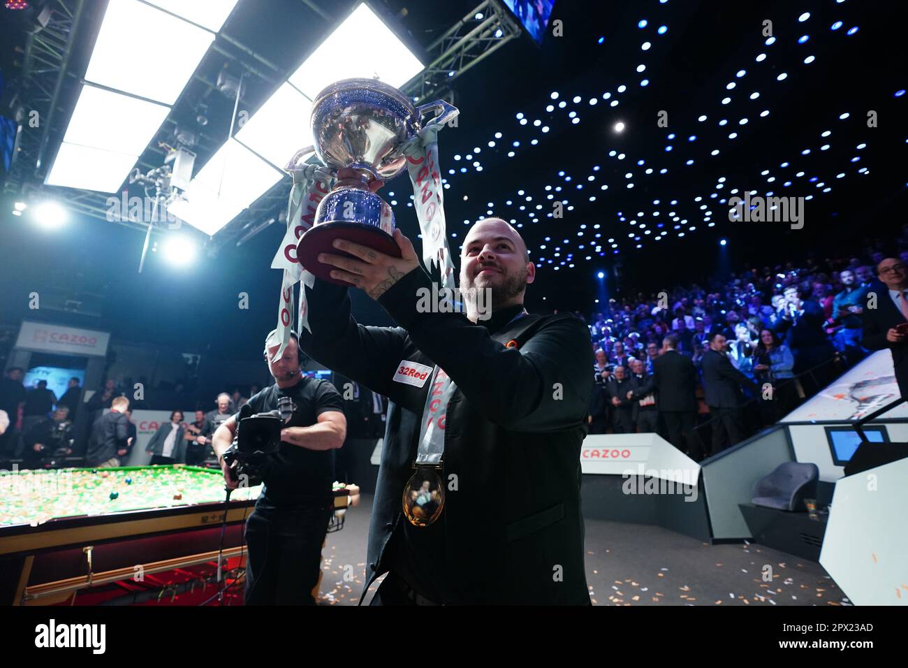 Luca Brecel celebrates after winning the final against Mark Selby (not ...