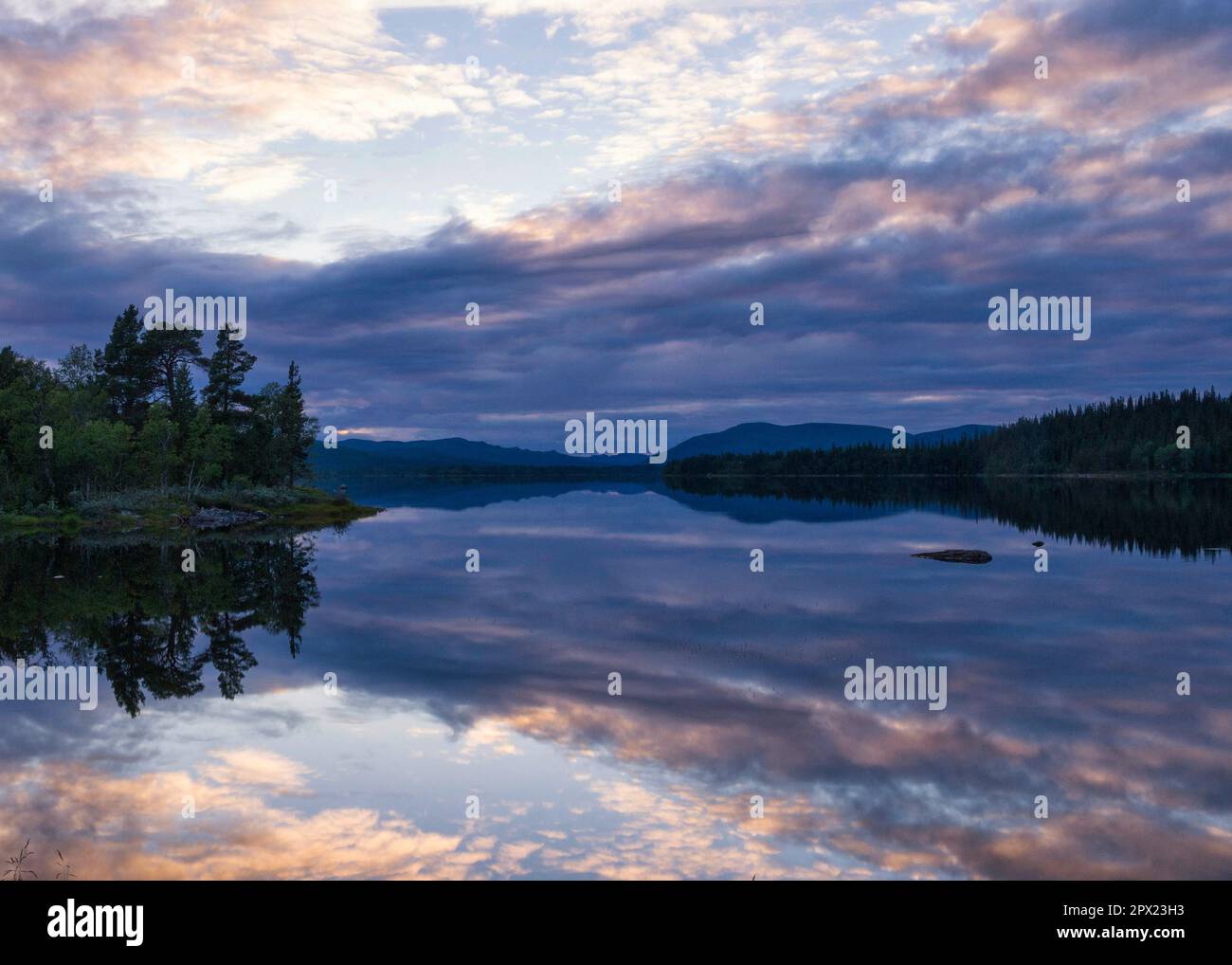 Beautiful sunset over lake Ostersjon near Tannas close to the Swedish ...