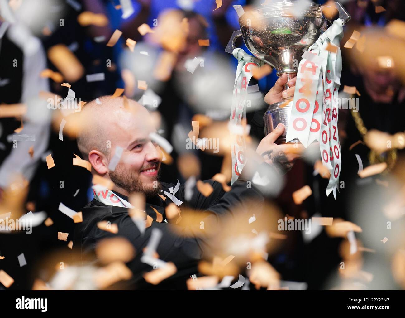 Luca Brecel celebrates after winning the final against Mark Selby (not ...