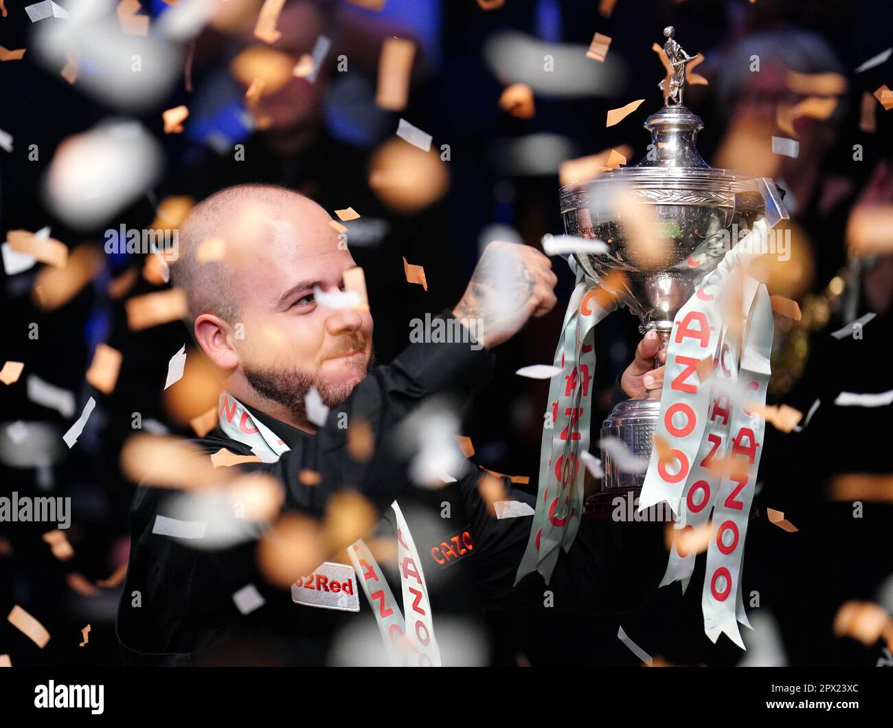 Luca Brecel celebrates after winning the final against Mark Selby (not ...