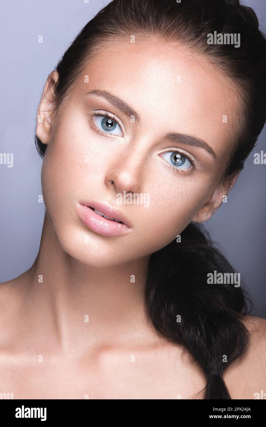 Beautiful young girl with a light natural make-up. Beauty face. Picture ...
