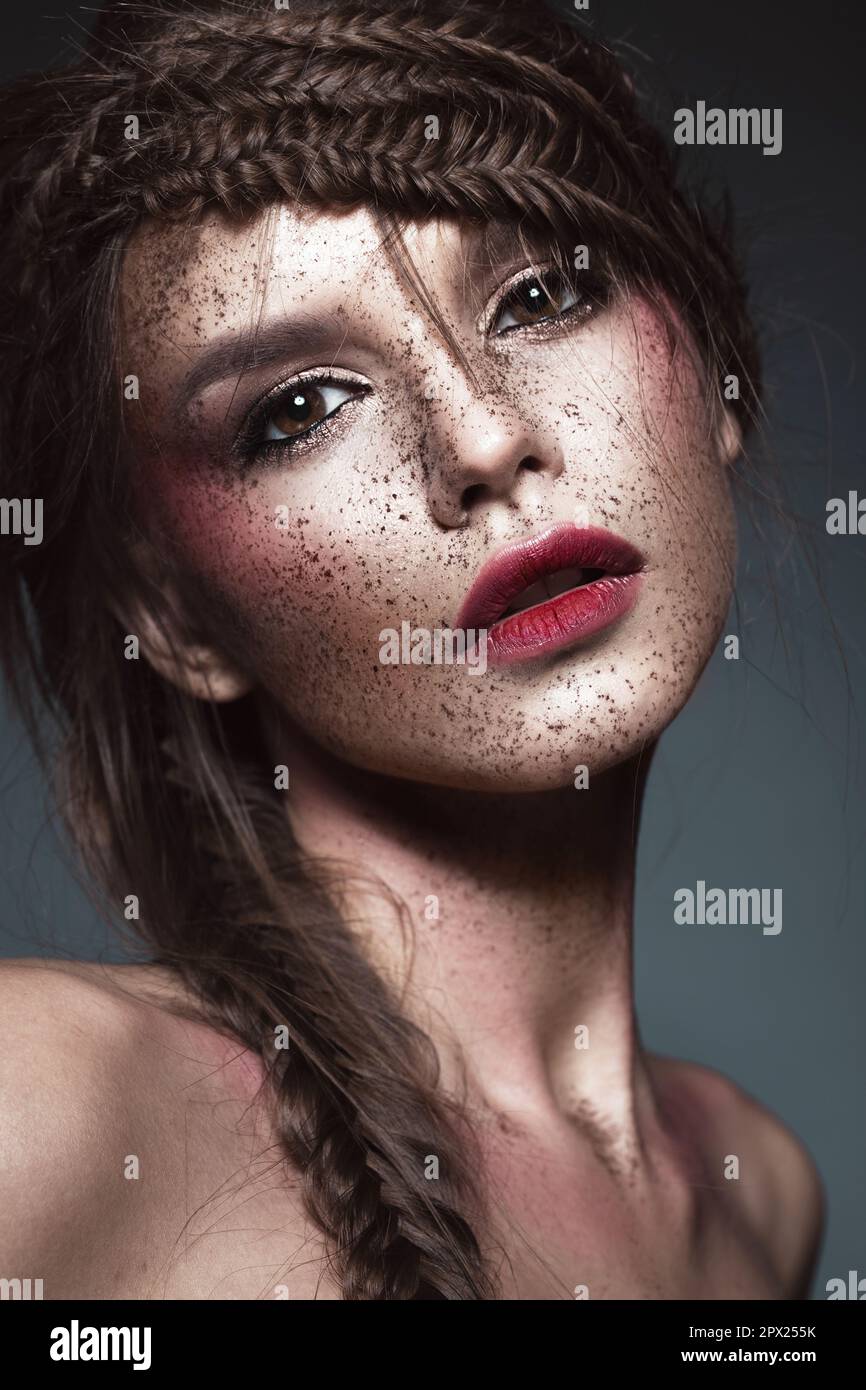 Beautiful strange girl with creative art make-up. Beauty face. Photo ...