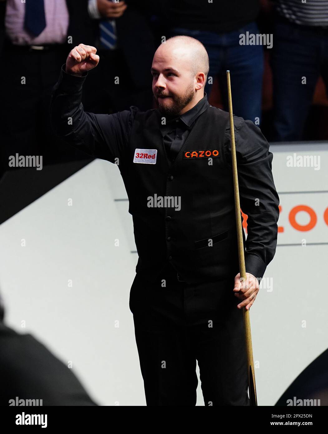 Luca Brecel celebrates after winning the final against Mark Selby (not ...
