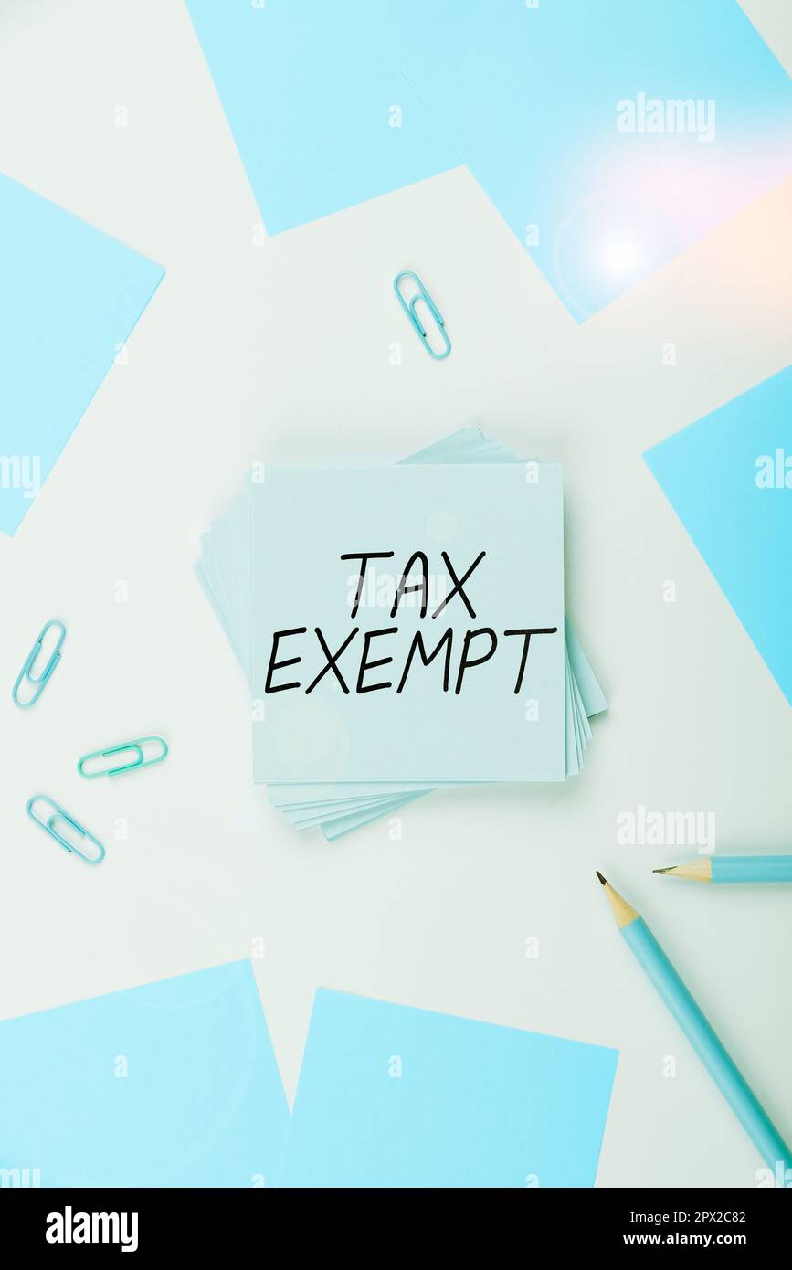 Sign displaying Tax Exempt, Word Written on Income or transactions ...