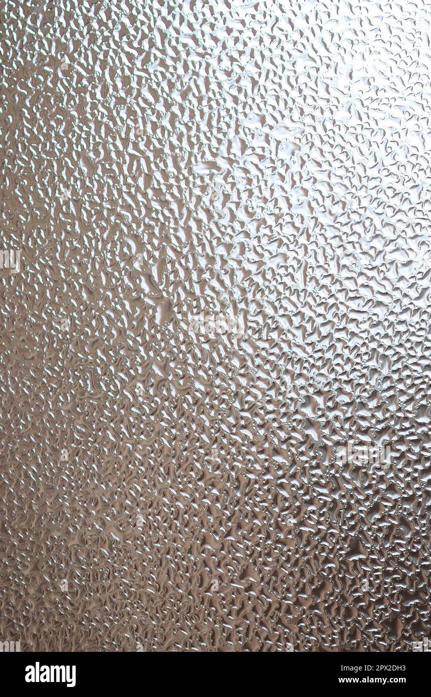 A photo of the glass surface of the window, covered with a multitude of ...