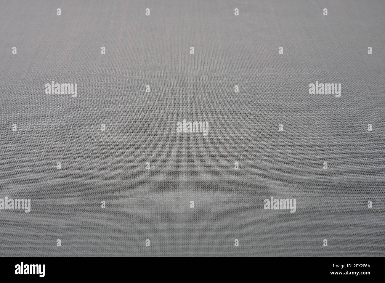 gray background fabric texture. A piece of woolen cloth is neatly laid ...