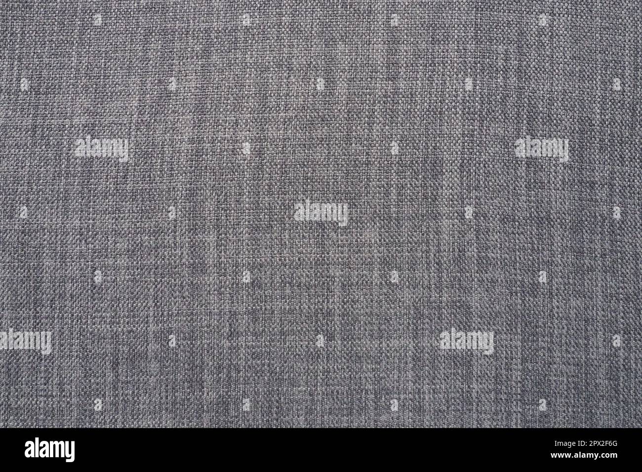 gray background fabric texture. A piece of woolen cloth is neatly laid ...