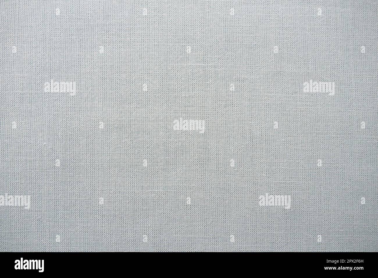 gray background fabric texture. A piece of woolen cloth is neatly laid ...