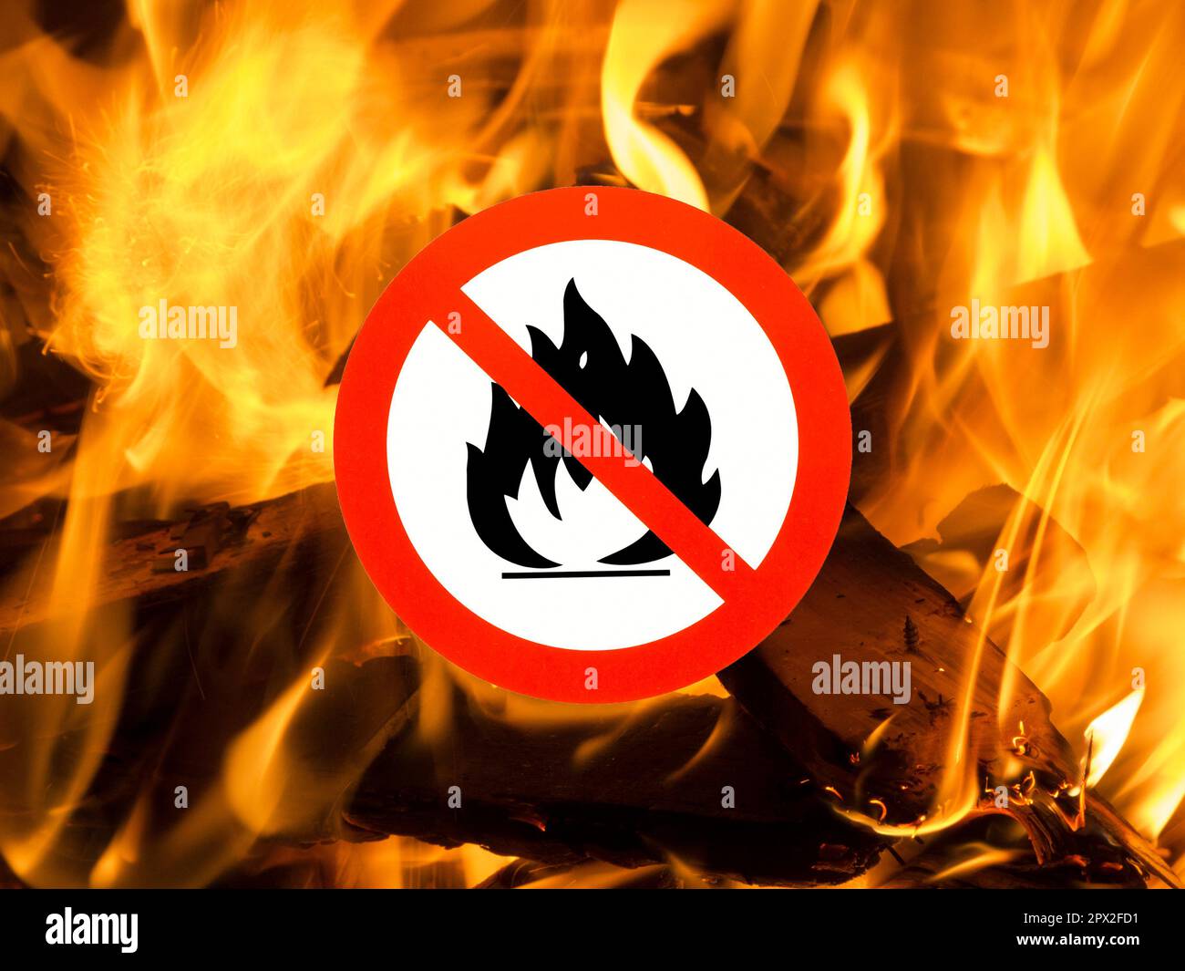 Close up of flames of flickering bonfire with inserted pictogram open ...