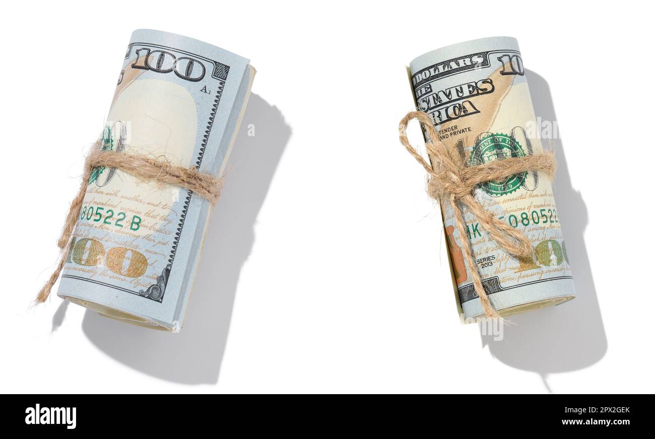 Rope tied roll of one hundred dollar bills isolated on white background ...