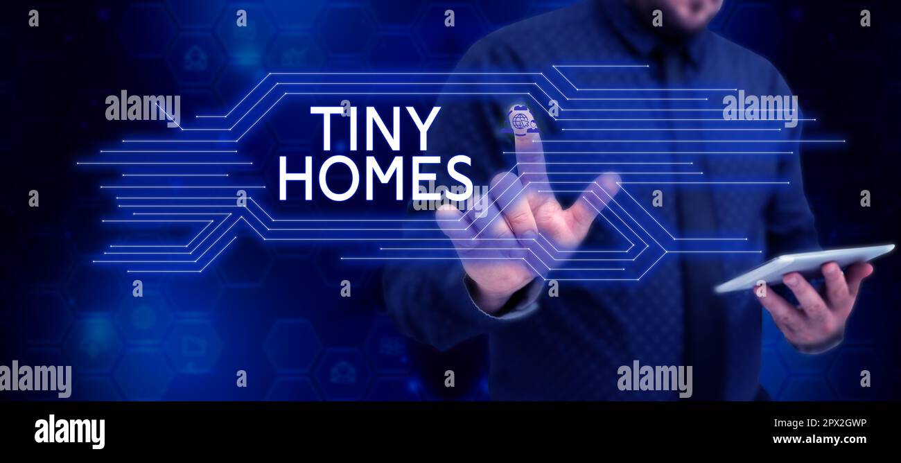 Hand writing sign Tiny Homes, Business showcase houses contain one room ...