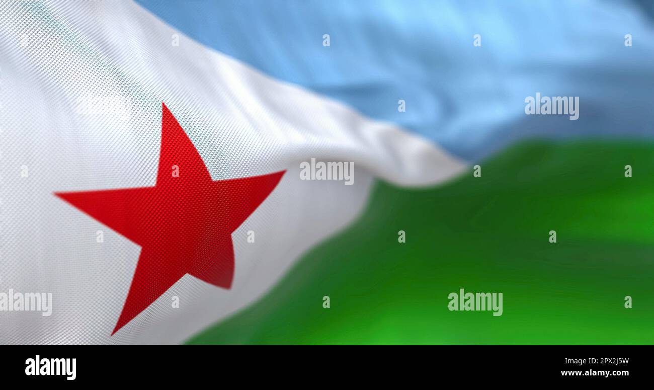 Close-up of the Djibouti national flag waving in the wind. The Republic ...