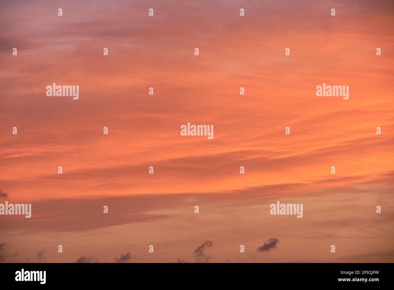 Sunset. Heaven, orange sky Sun rays Wallpaper Clouds Stock Photo - Alamy