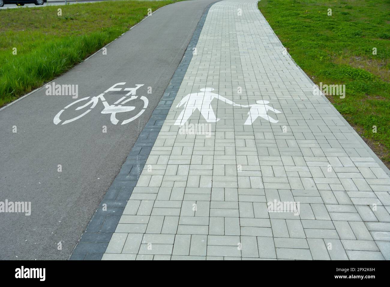 Path for pedestrian and bicycle traffic only and green grass Stock ...