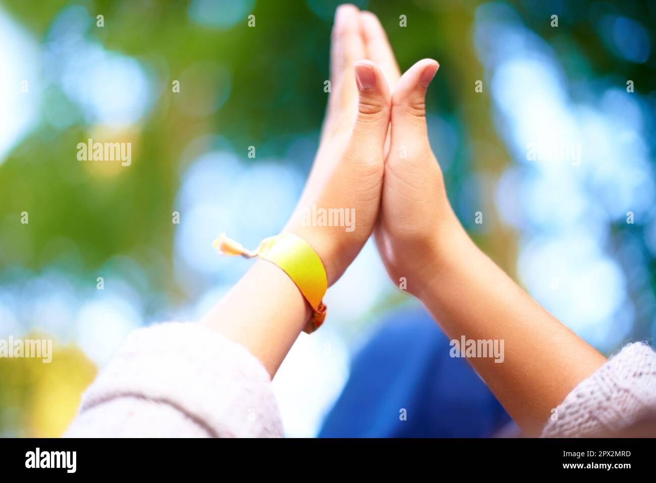 High Five. two woman giving one another a high five Stock Photo - Alamy