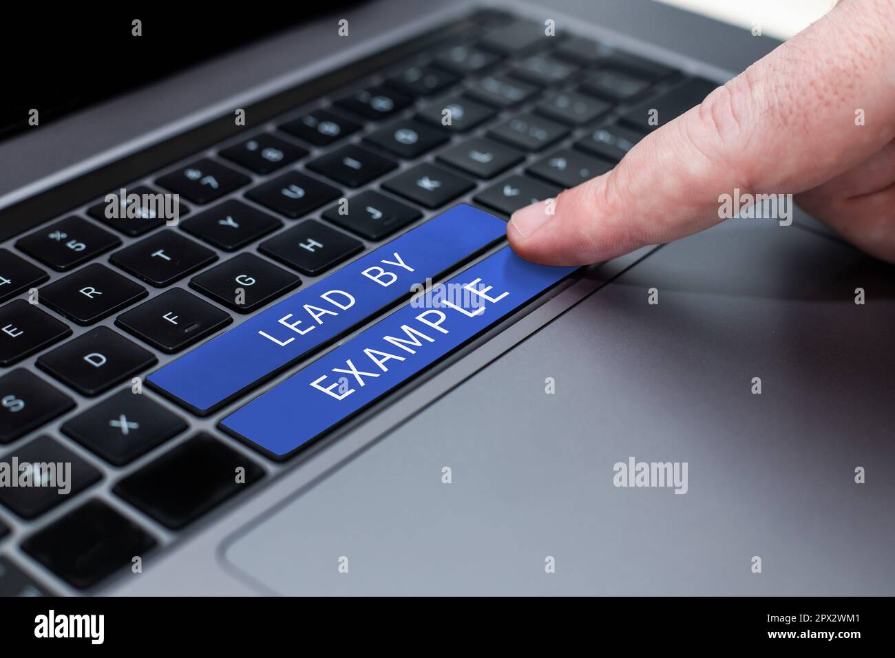 Writing displaying text Lead By Example, Concept meaning Be a mentor ...